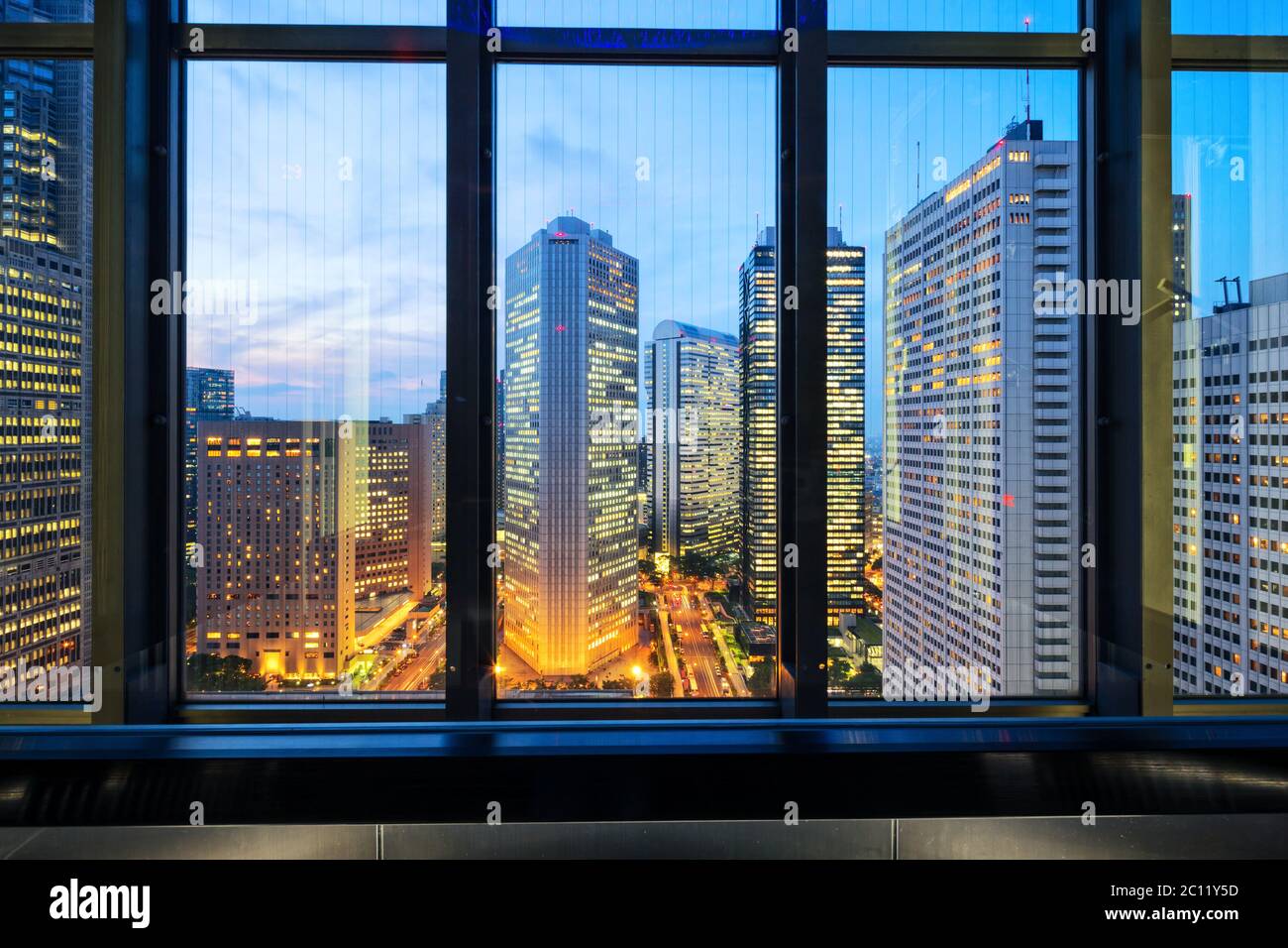 modern office buildings in tokyo through window Stock Photo - Alamy