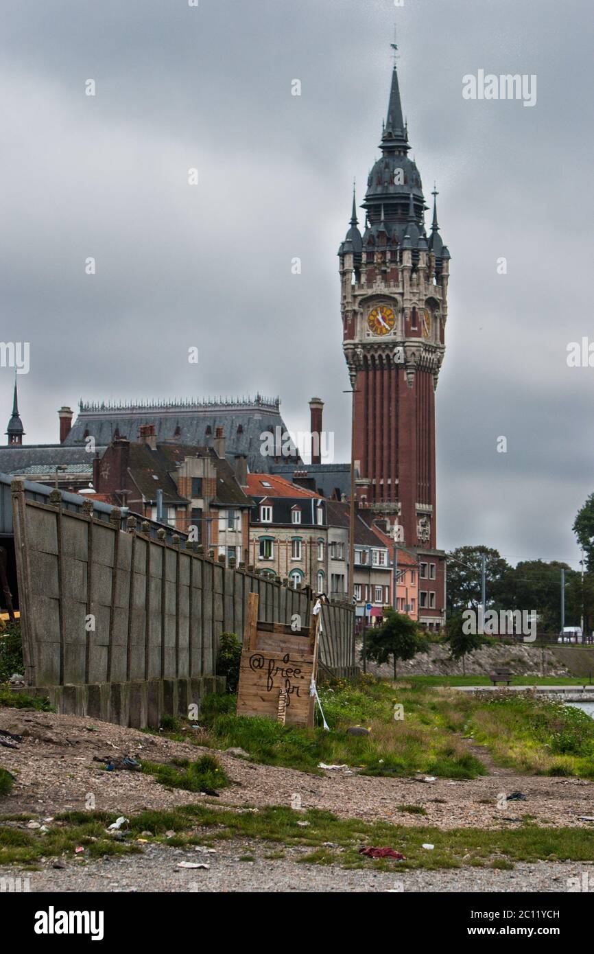 Calais town hall tower dominates the skyline for miles around Stock ...