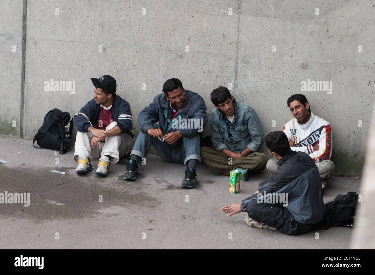 Immigrants on the back streets of Calais Stock Photo - Alamy