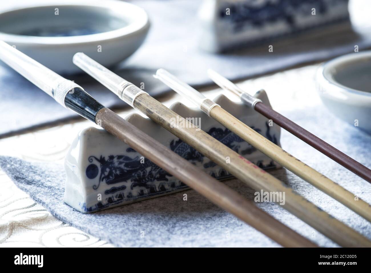 chinese brush pens on stone Stock Photo - Alamy
