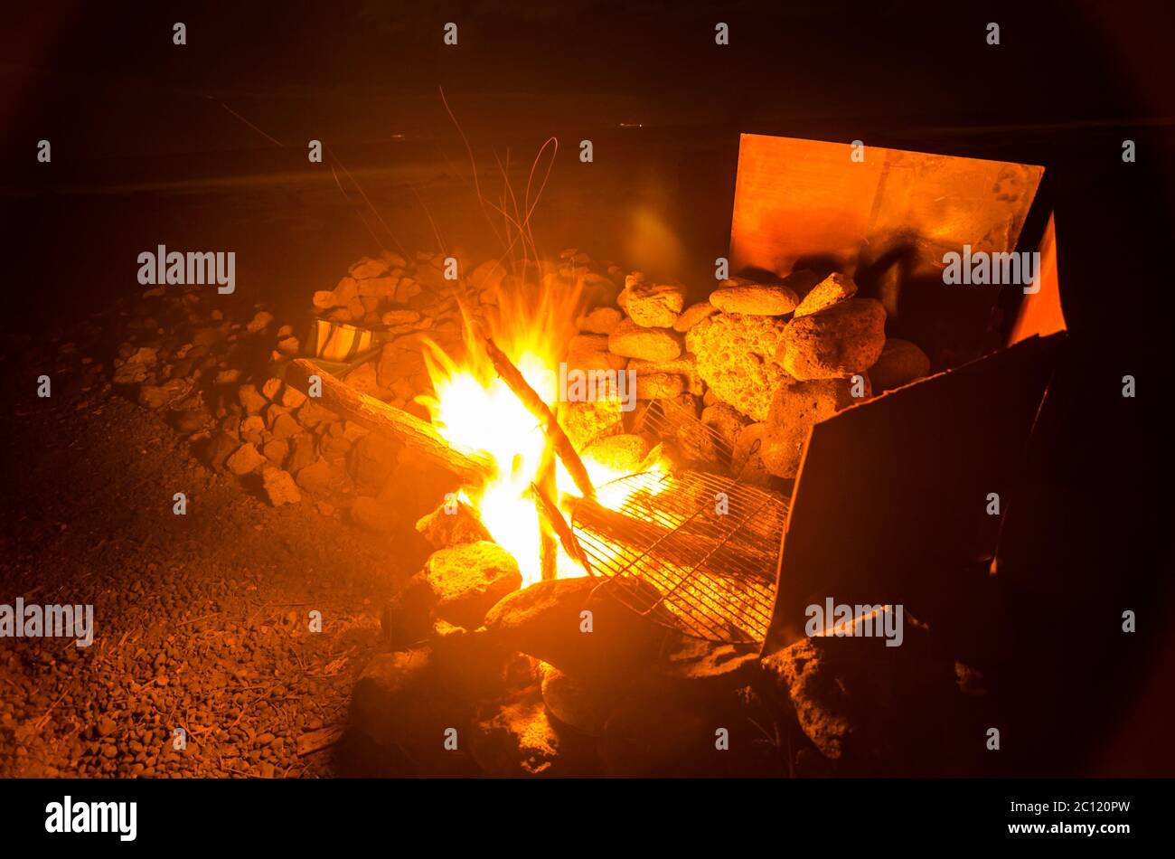 Camp fire in the night Stock Photo - Alamy
