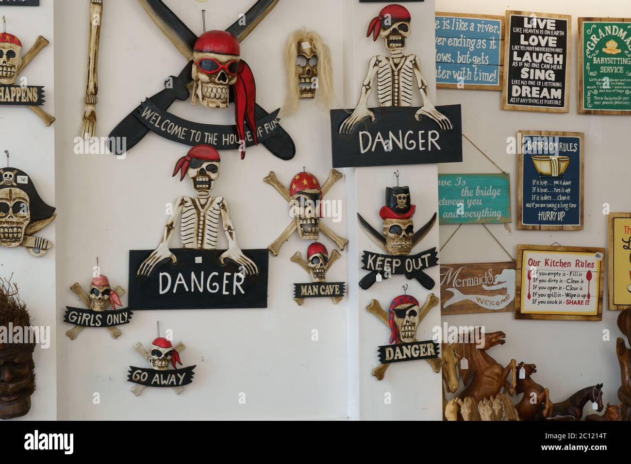 Shop wall display with hanging picture frames with motto's and ...