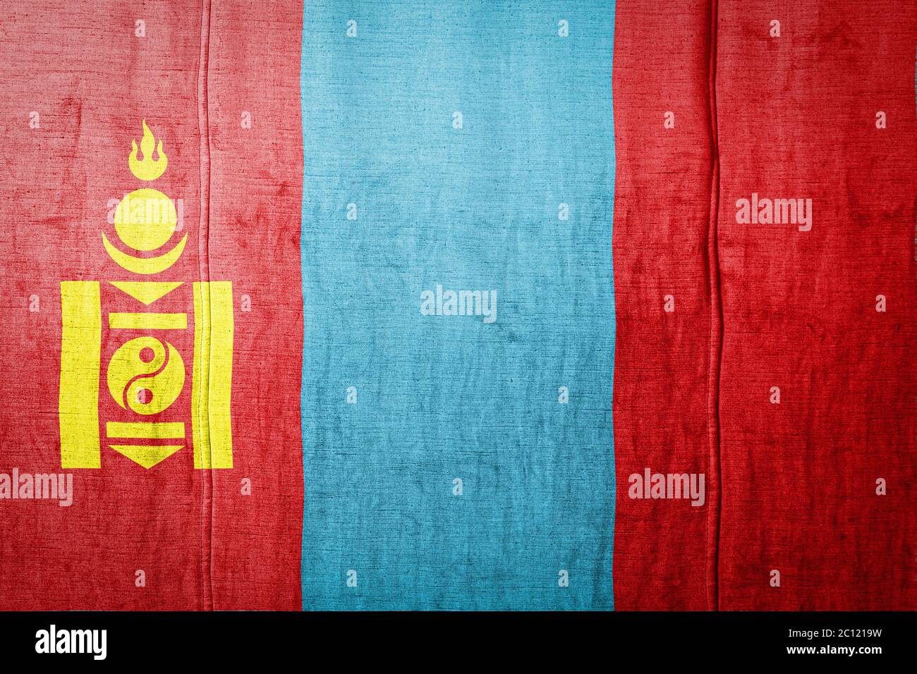 National flag of Mongolia depicting in paint colors on old textile ...