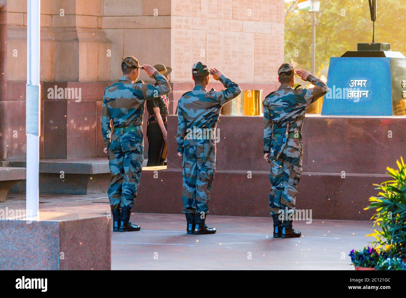 An army soldiers standing under the India Gate war memorial wearing ...