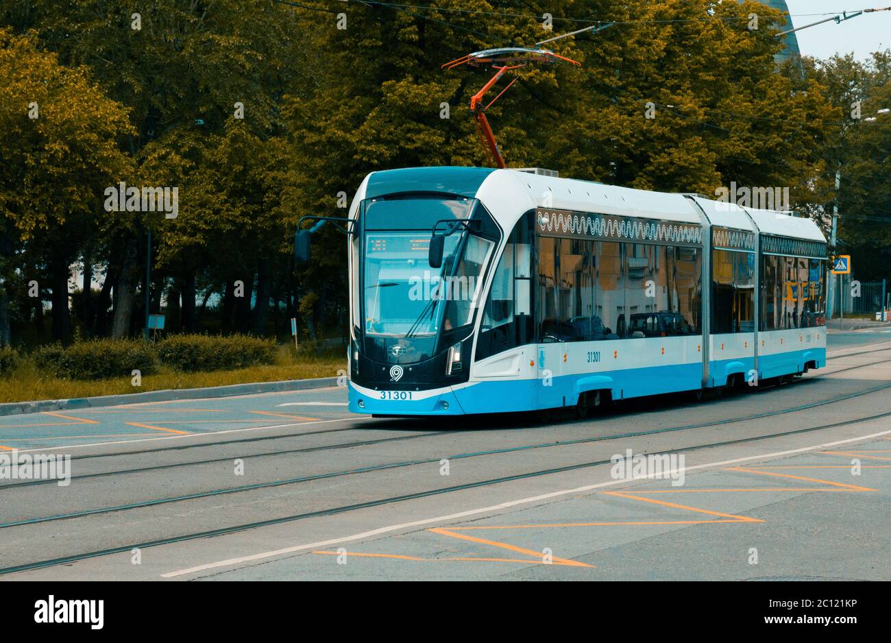 Modern public transport the blue tram follows its own route. Moscow ...