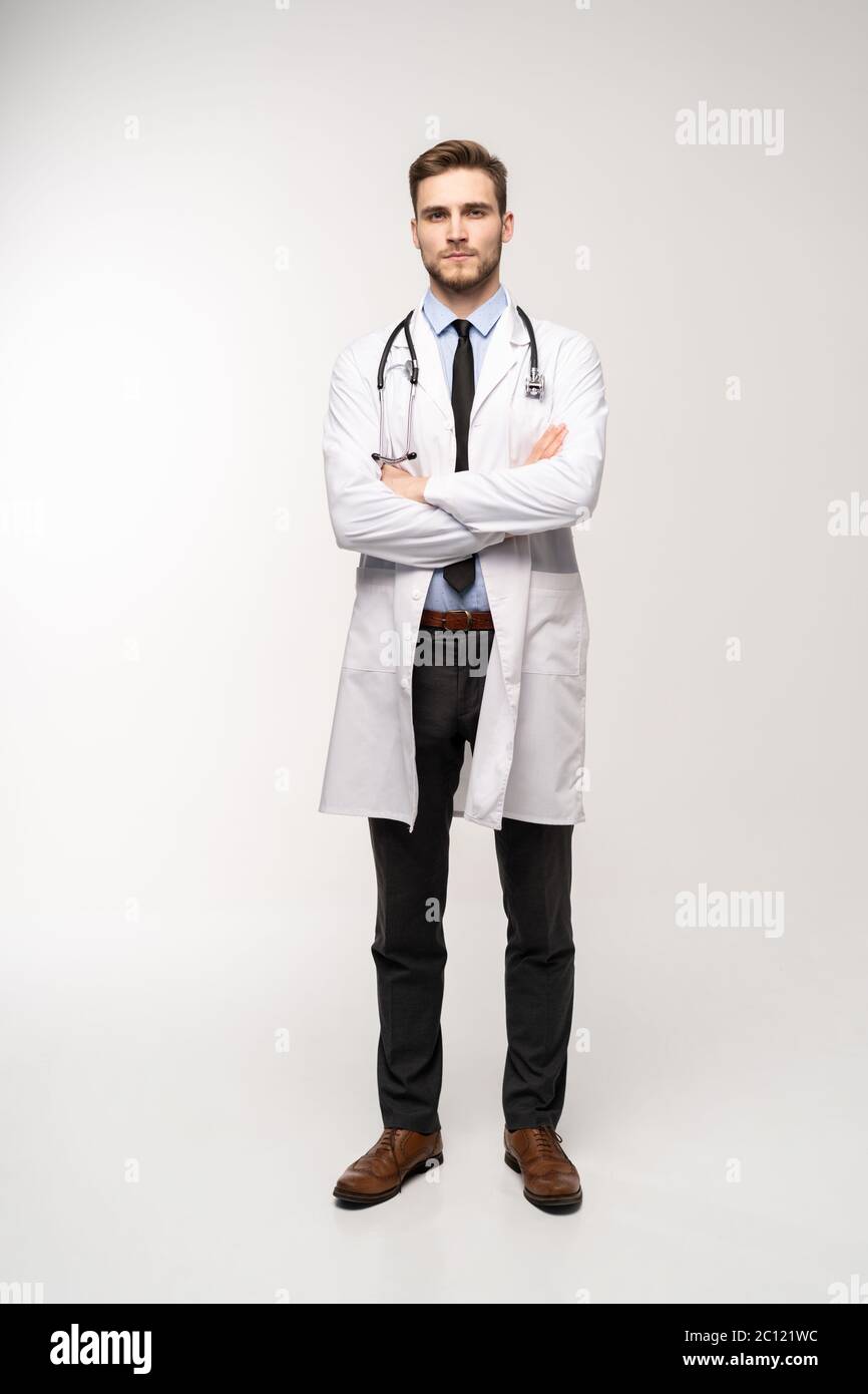 Full length young medical doctor on white background Stock Photo - Alamy