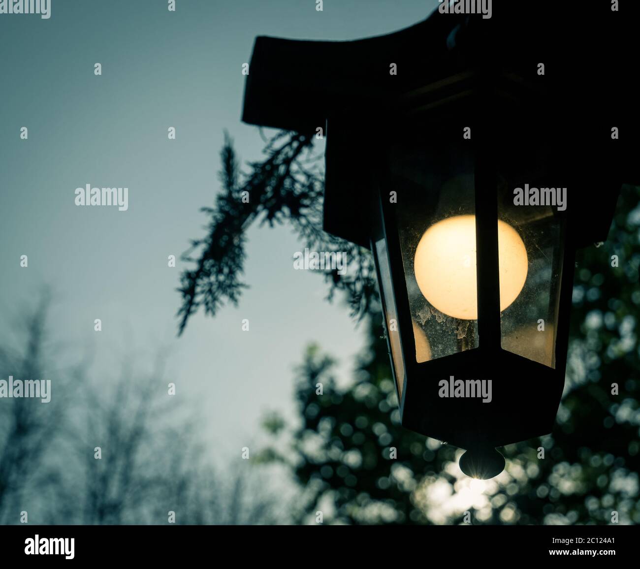 Vintage street lamp or lamp post hanging Stock Photo - Alamy