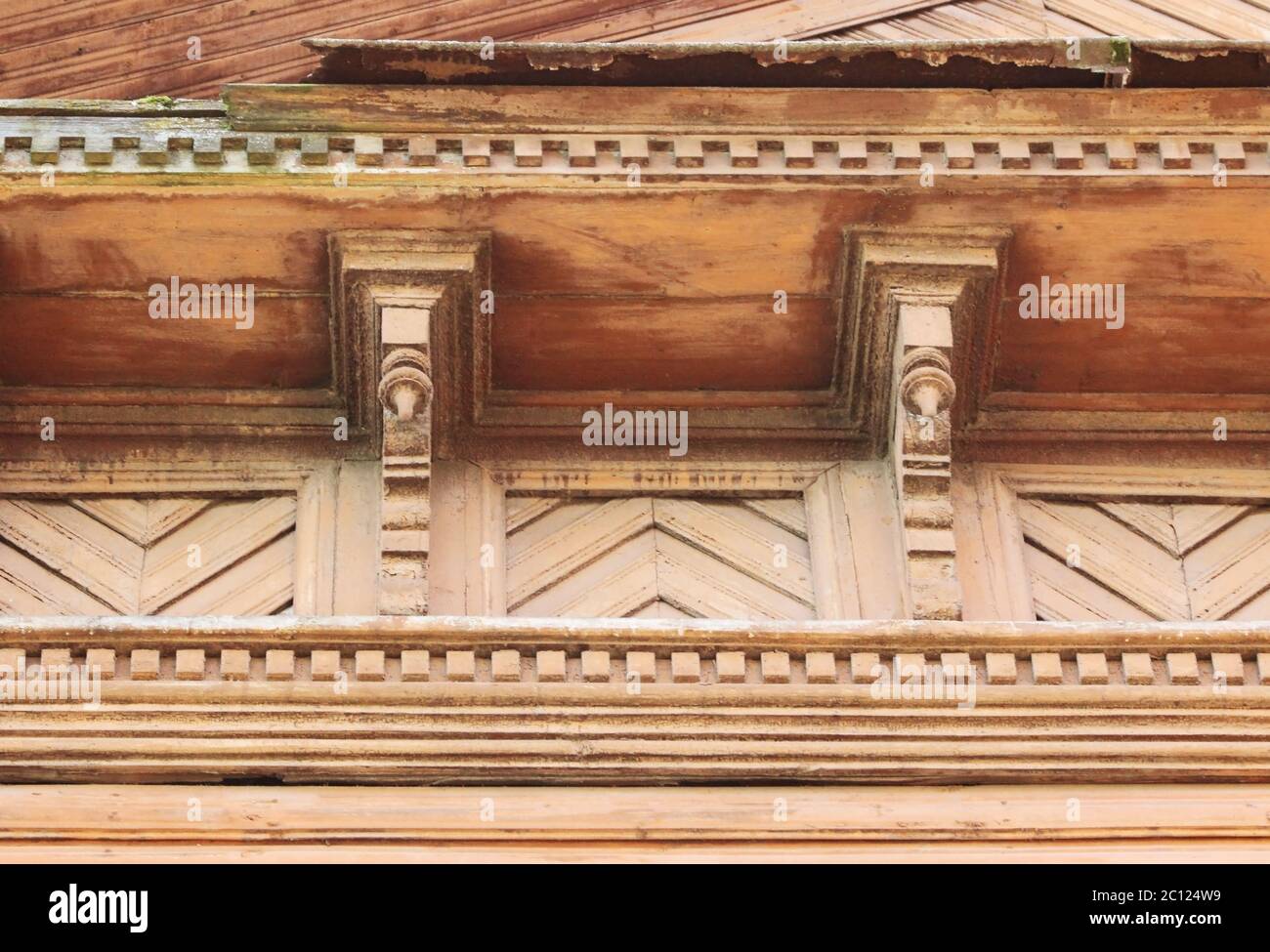 artsy decor trim and classic old wooden house. triangular patterns wood ...