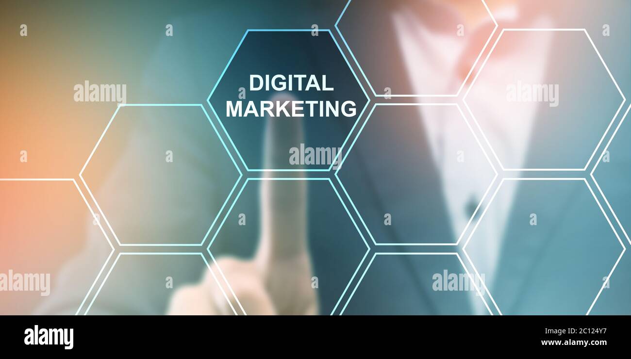 Businessman pressing button with words DIGITAL MARKETING on virtual ...