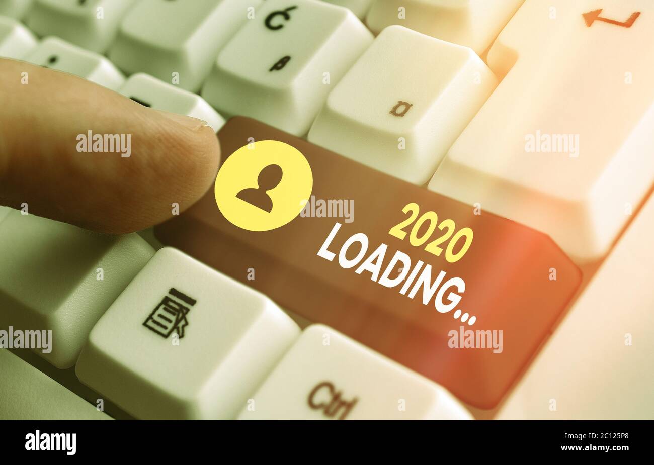 Writing note showing 2020 Loading.... Business concept for a year ...