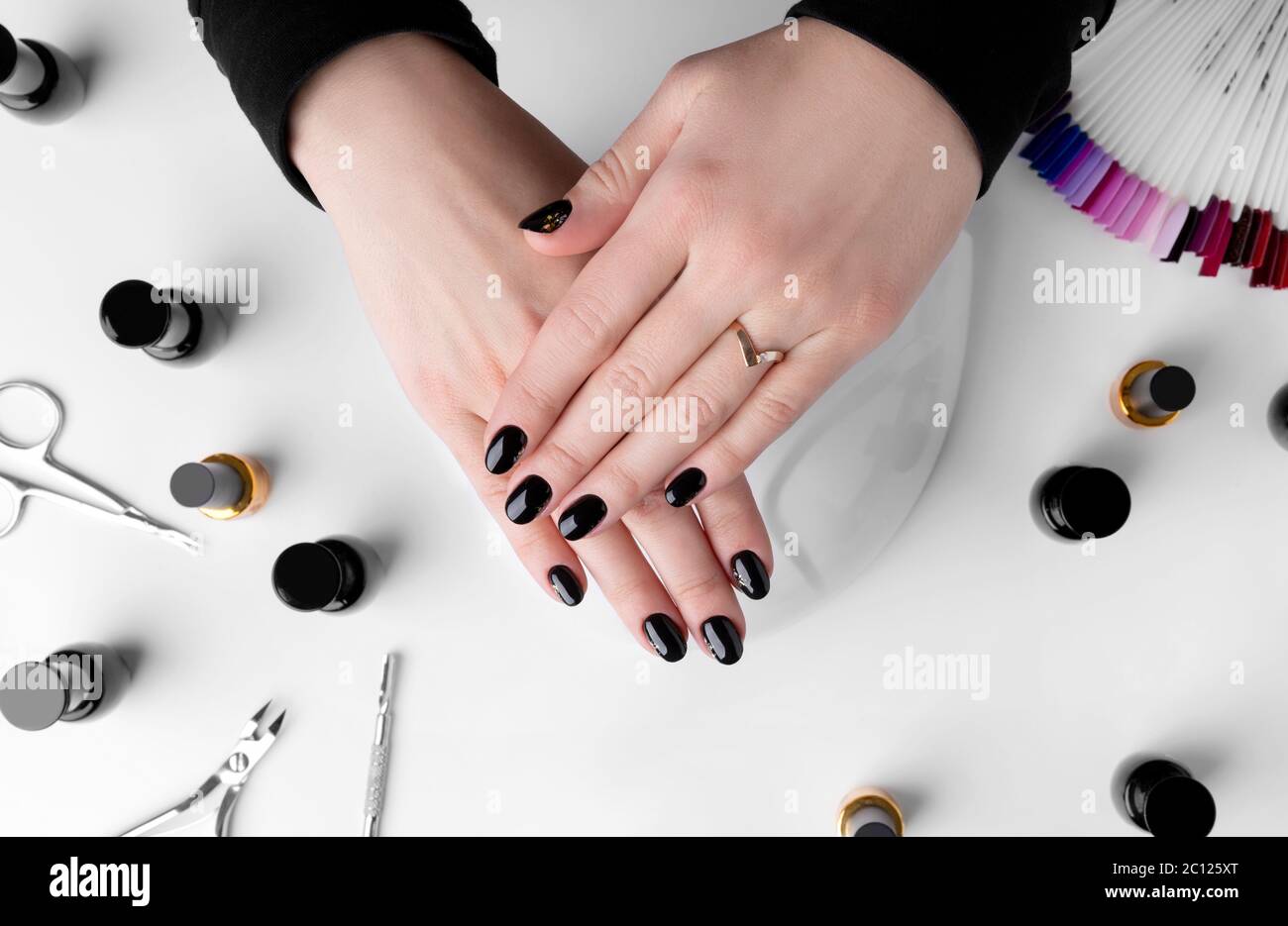 Master in process making manicure hi-res stock photography and images ...