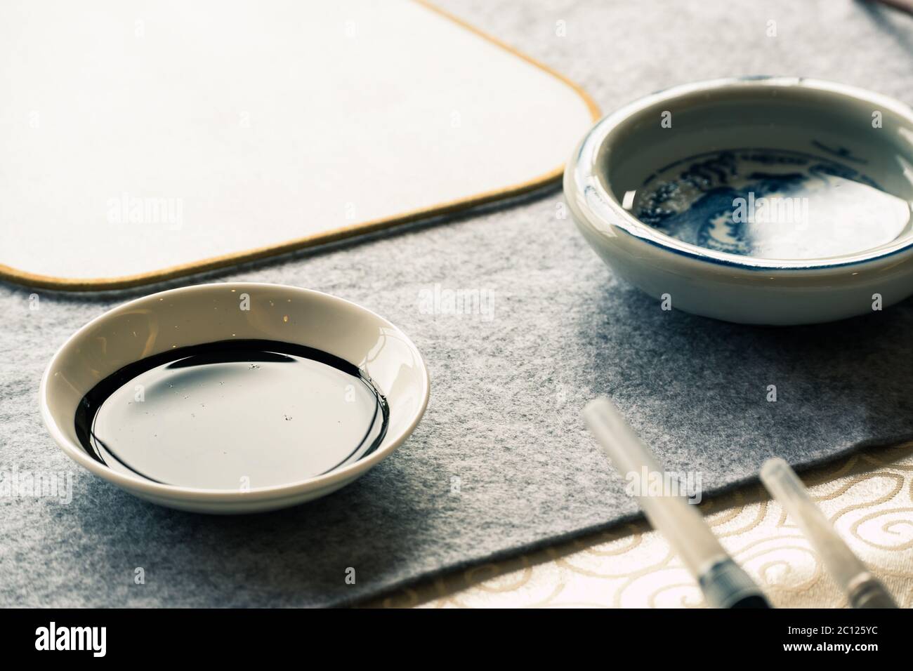 chinese calligraphy tools on table Stock Photo - Alamy