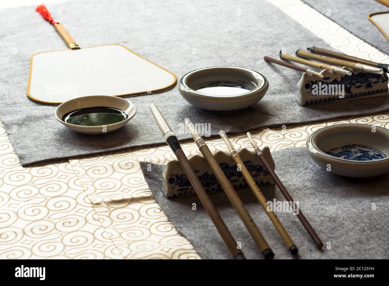 chinese calligraphy tools on table Stock Photo - Alamy