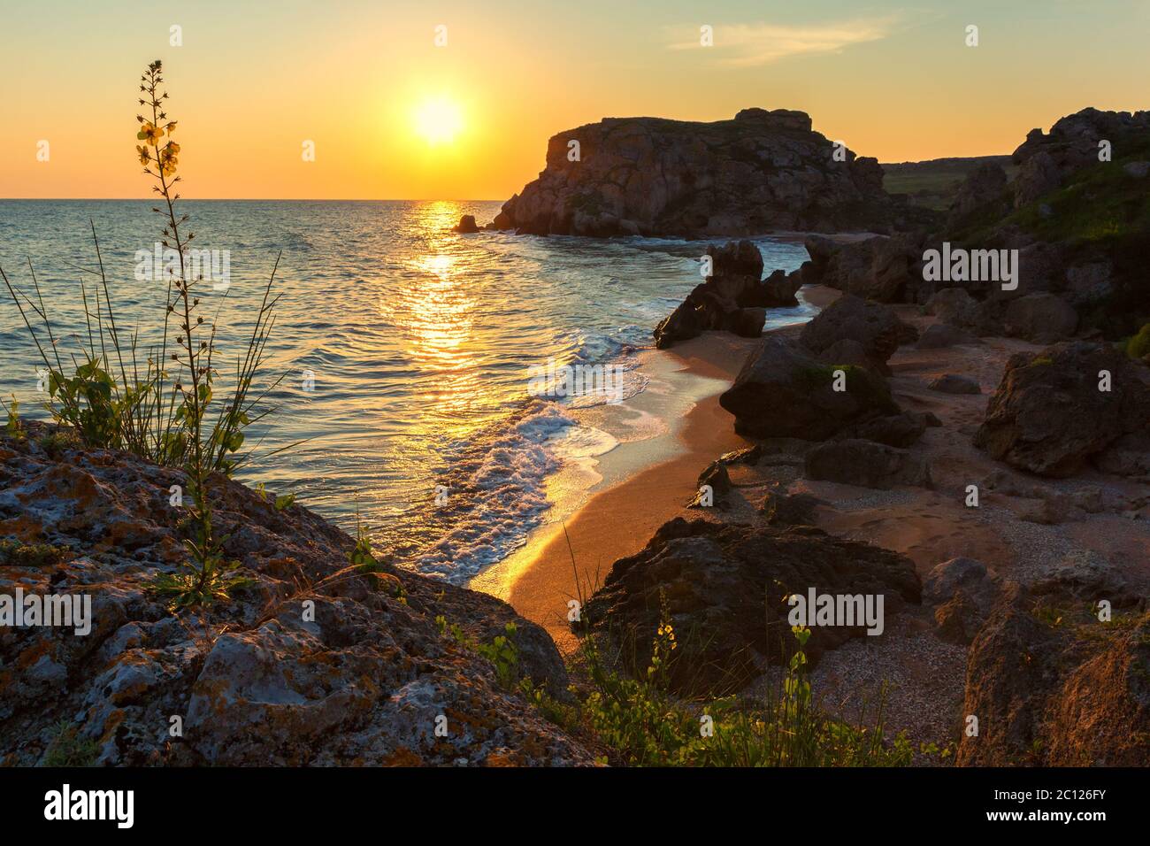 Sun rises over the Sea of Azov on Generals beach. Karalar regional ...