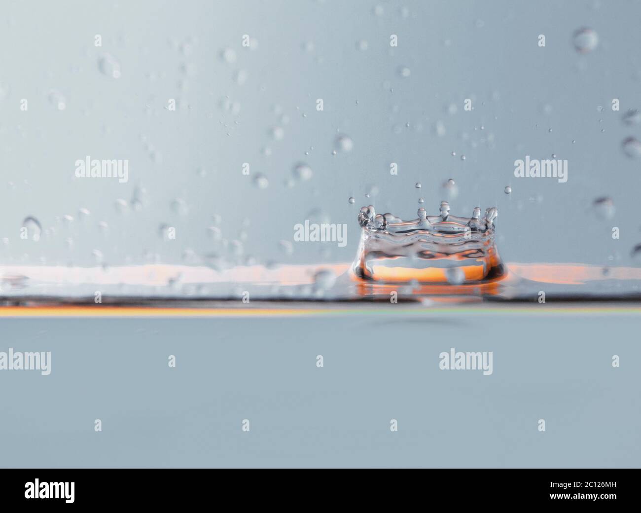 Water drop splashing with waves Stock Photo - Alamy