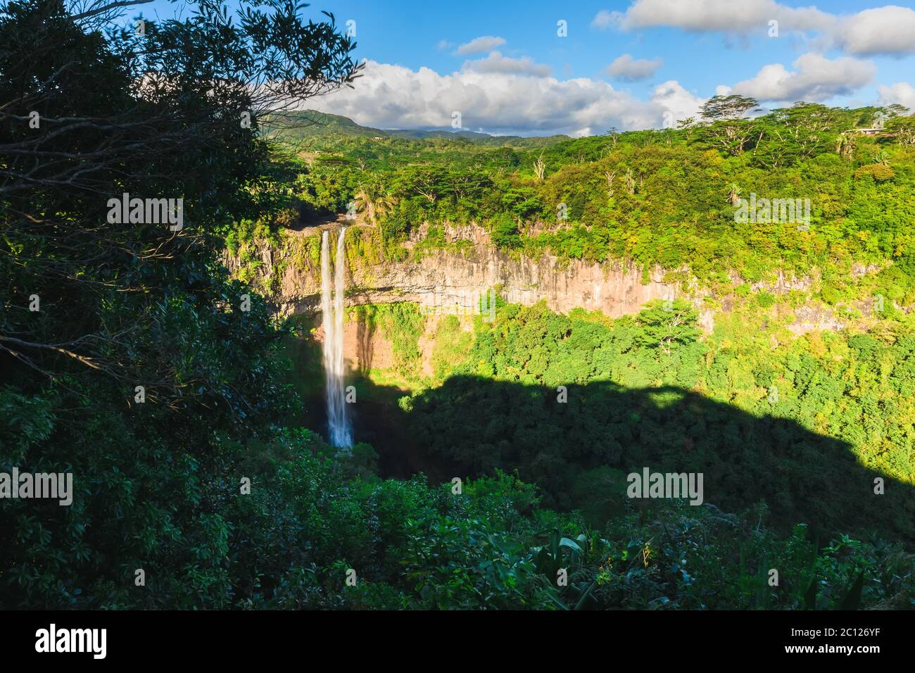 Chamarel waterfall and cliff in the tropical jungle of Mauritius Stock ...