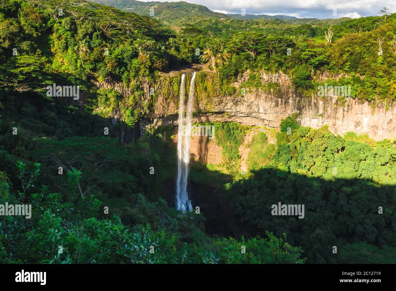 Aerial view of Chamarel Waterfall in tropical jungle of Mauritius Stock ...