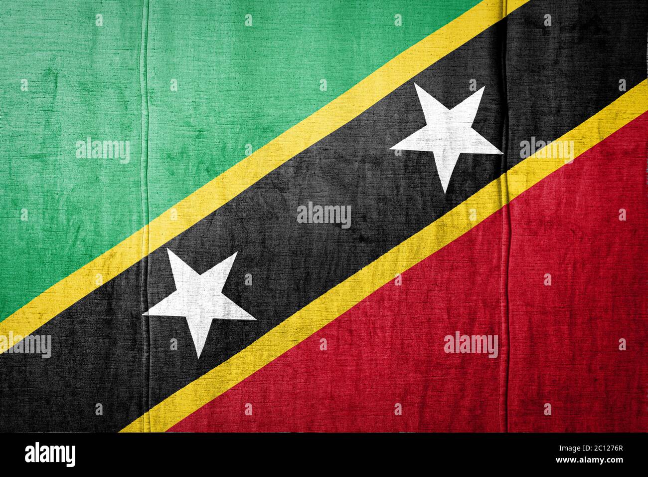 National flag of Saint Kitts and Nevis depicting in paint colors on old ...