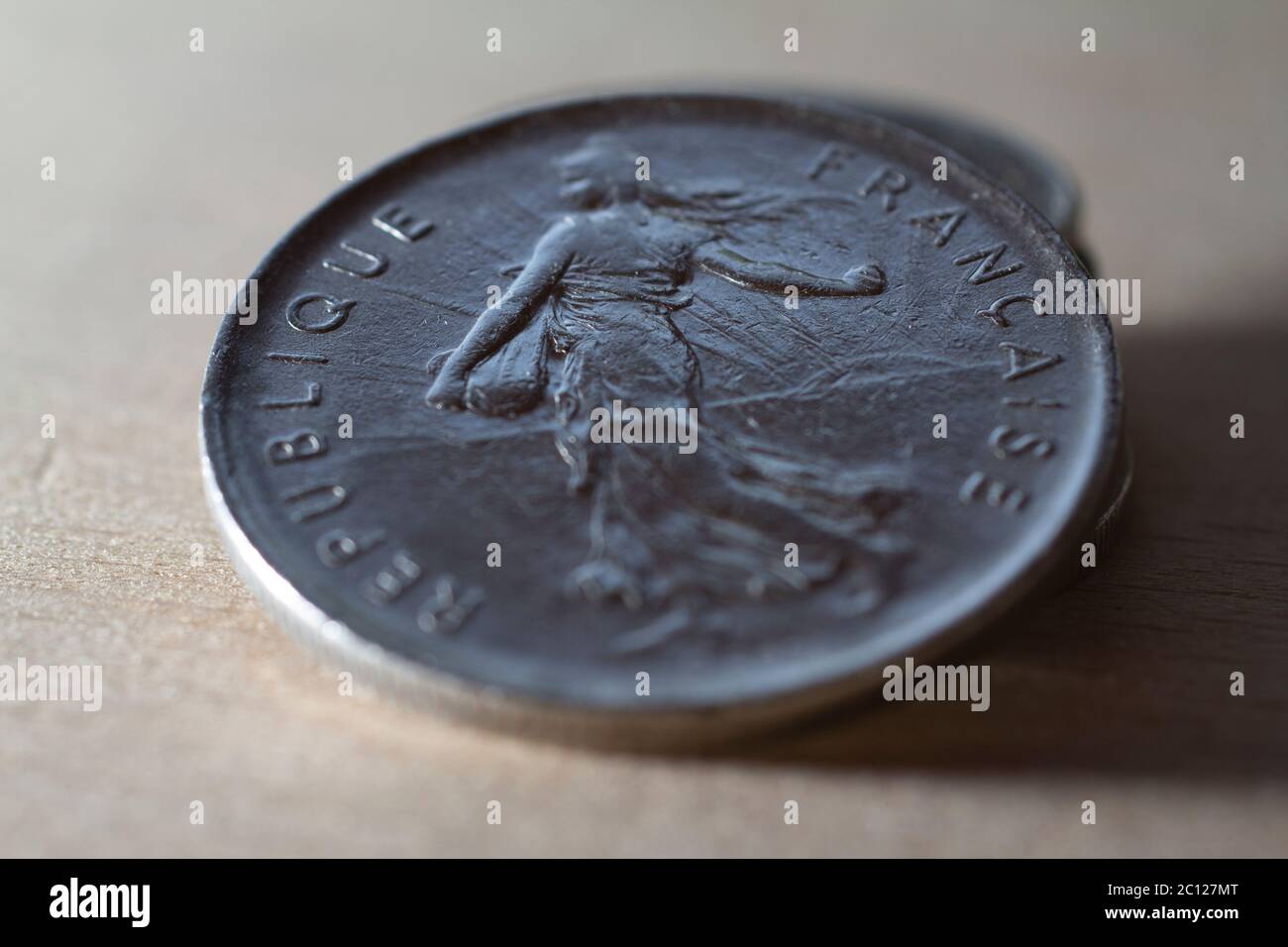 French Franc coin, currency of France prior the Euro Stock Photo - Alamy