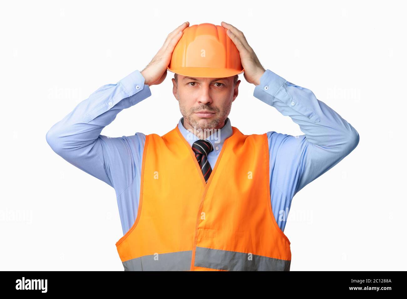 Construction worker helmet male serious hi-res stock photography and ...