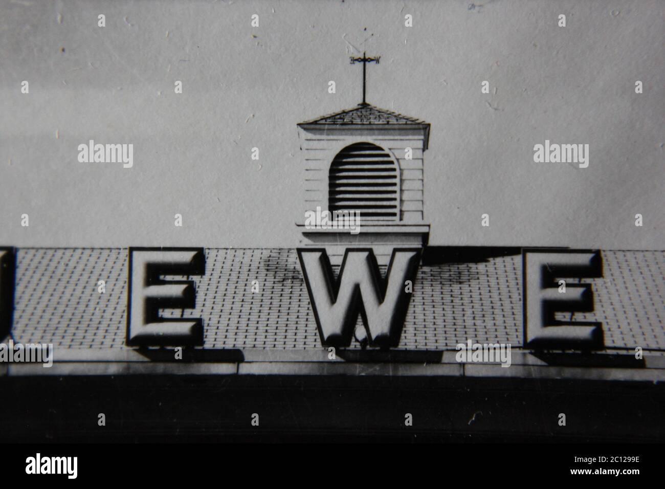 Fine 1970s vintage black and white photography of a store marquee in a ...