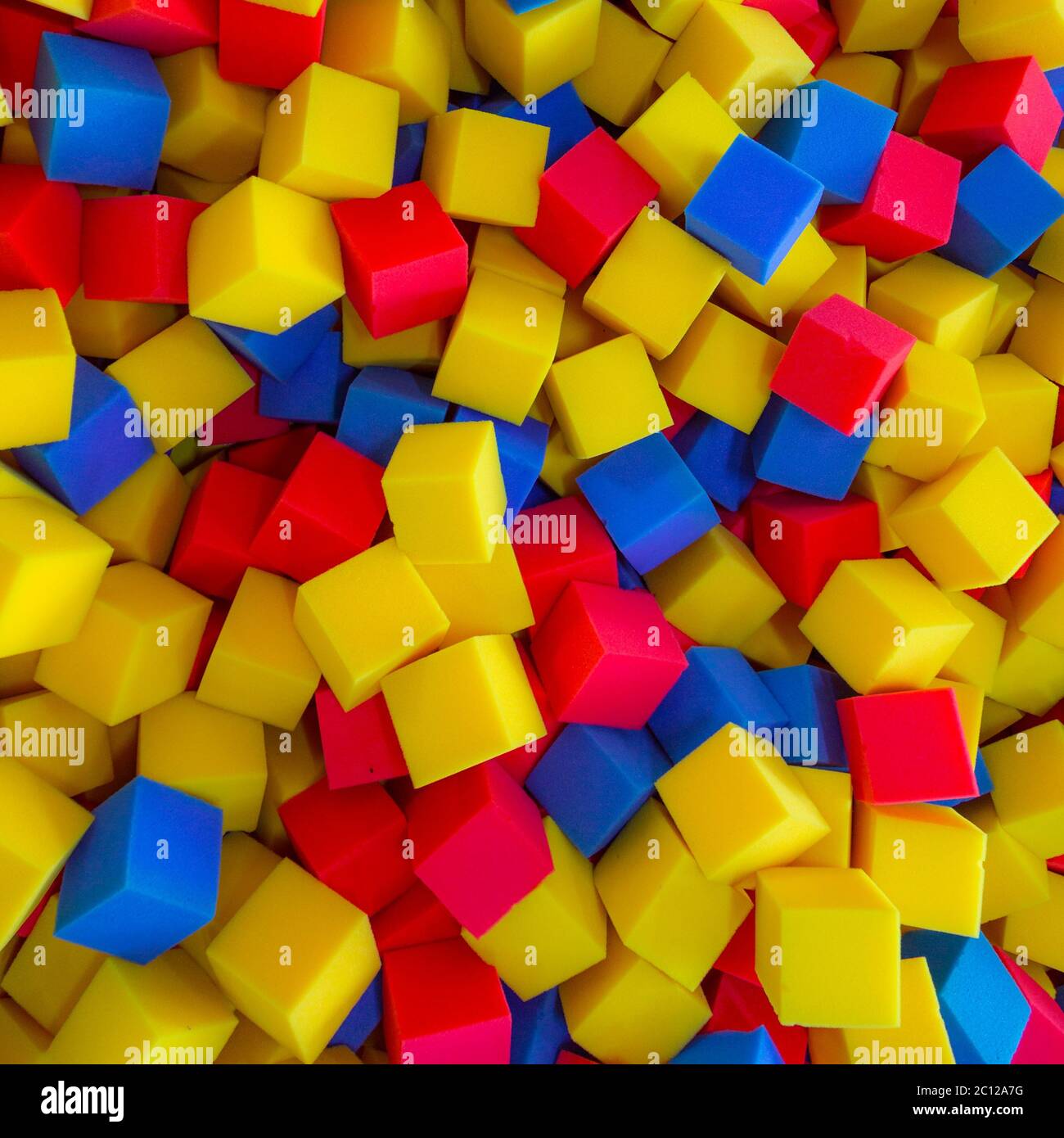 Colored foam rubber cubes background Stock Photo - Alamy