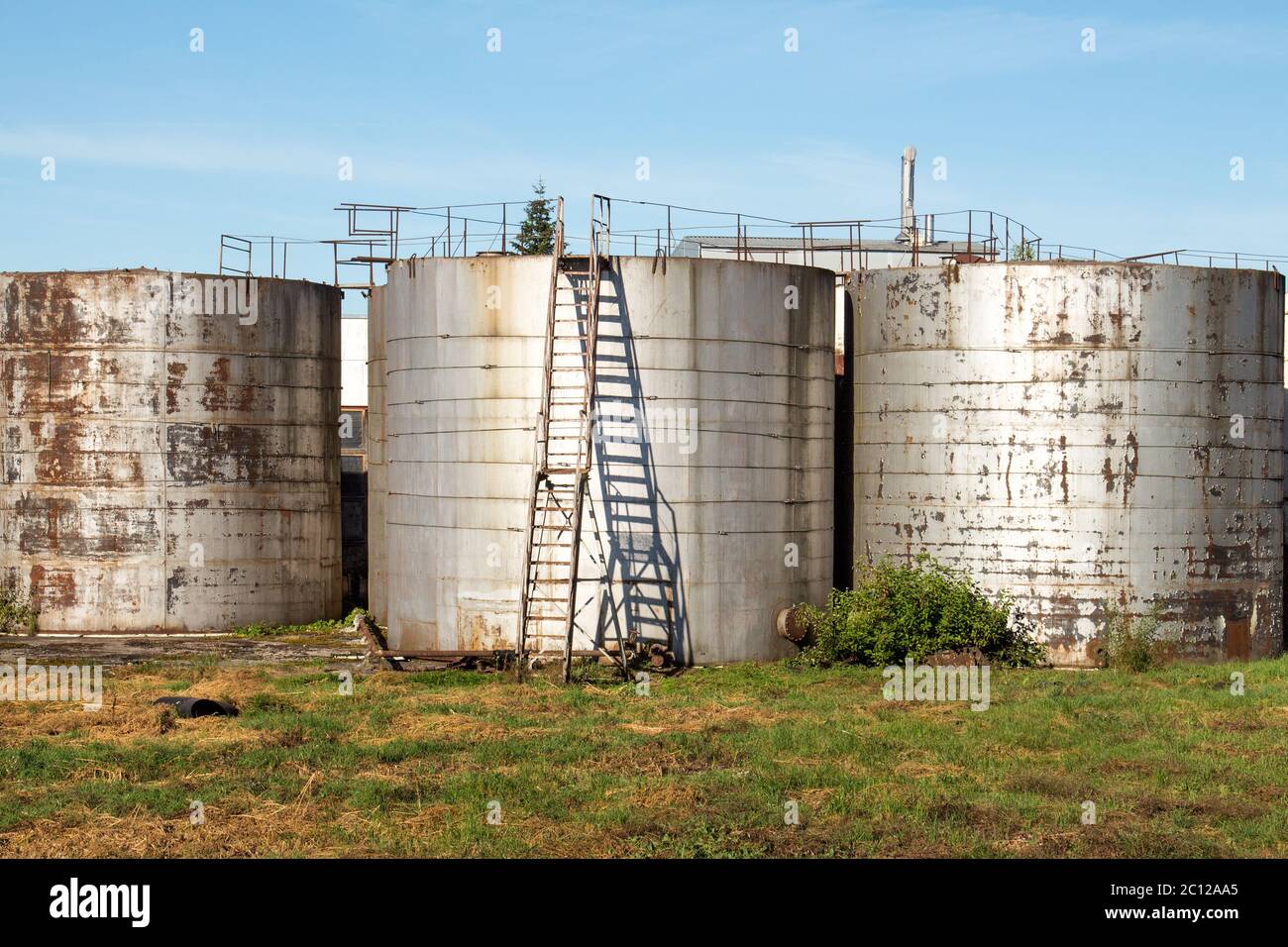 Old industrial storage tank Stock Photo - Alamy