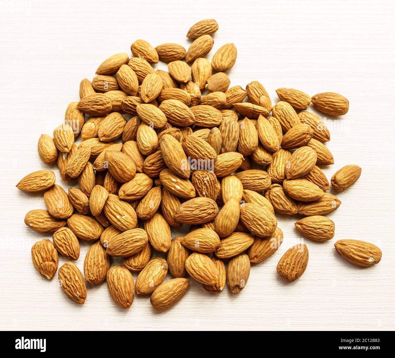 Roasted raw peeled almonds hi-res stock photography and images - Alamy
