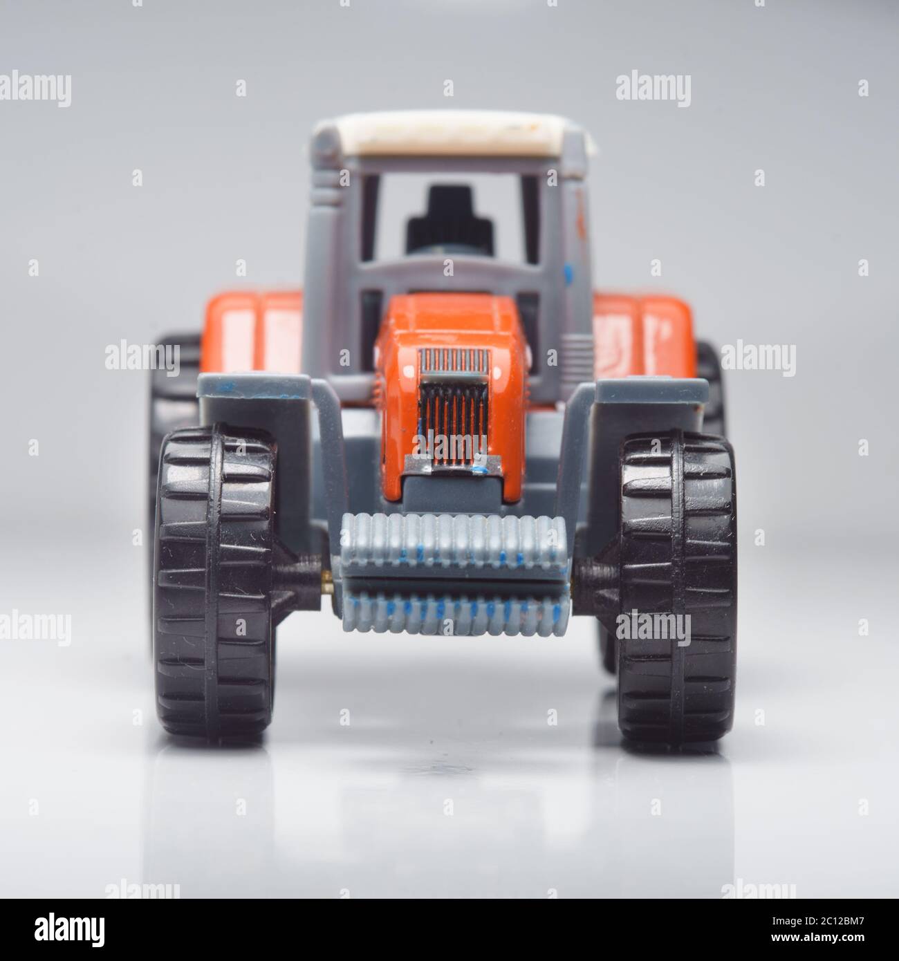 Agricultural Toy Tractor Stock Photo - Alamy