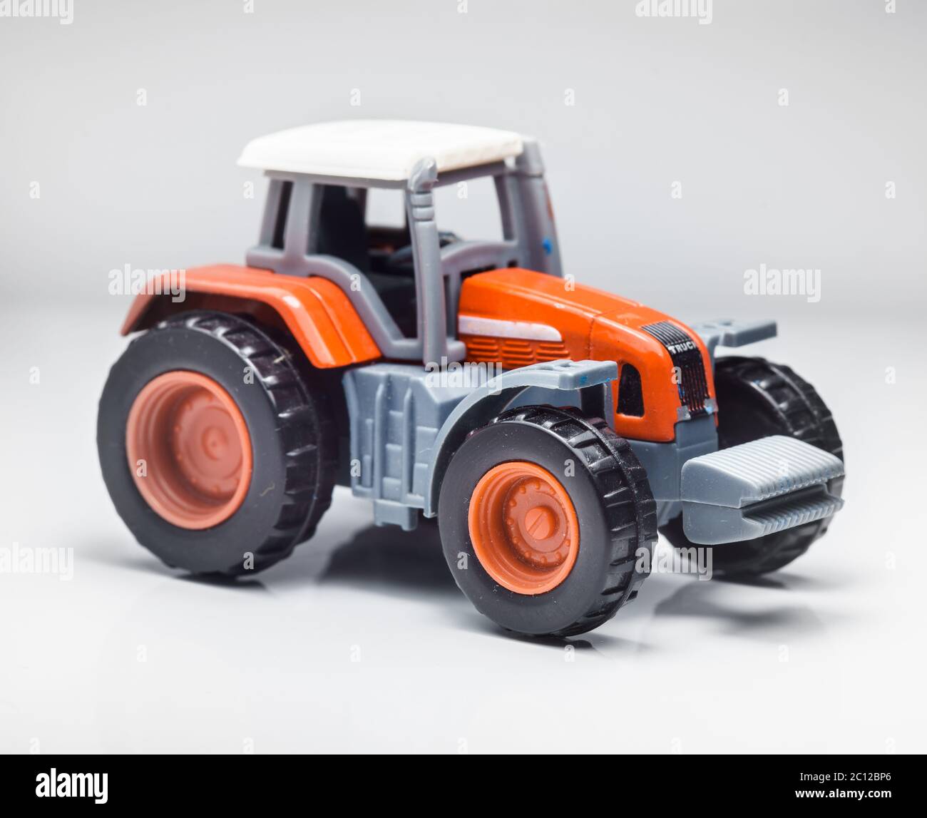 Agricultural Toy Tractor Stock Photo - Alamy