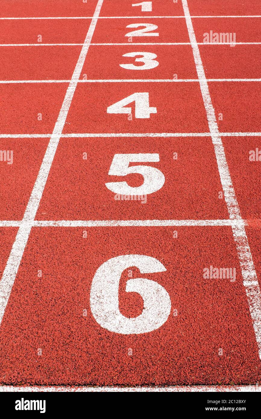 Starting line at running track Stock Photo - Alamy