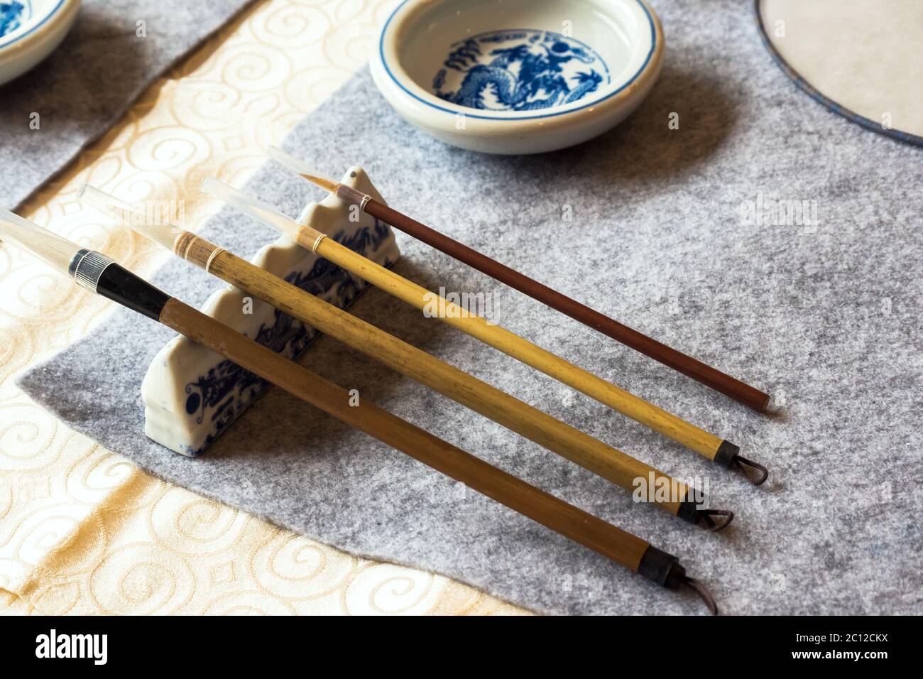chinese calligraphy tools on table Stock Photo - Alamy
