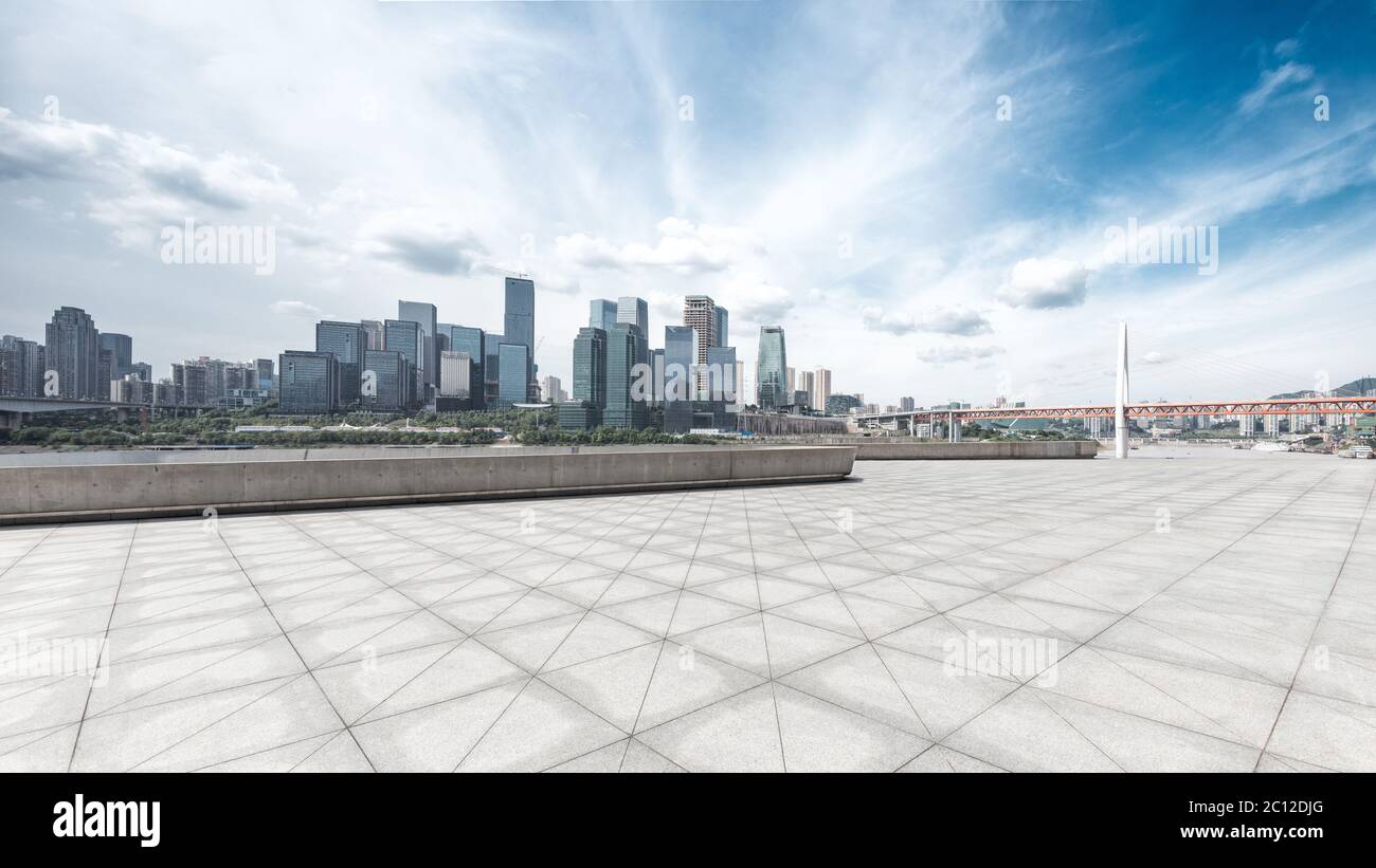 cityscape and skyline of chongqing from empty brick floor Stock Photo ...