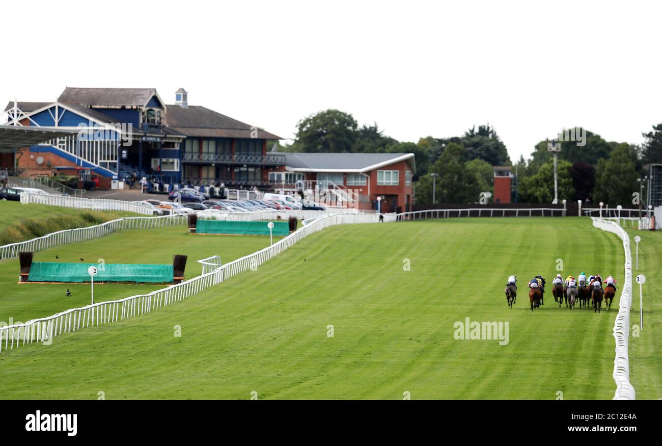 Runners and riders approach the empty grandstand in the West Knighton ...
