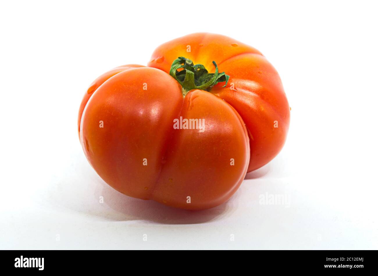 Red raf tomato on white background Fresh vegetable. Healthy eating ...