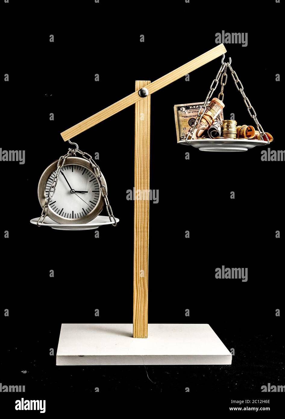 Clock and Currency Time is Money Concept Stock Photo - Alamy