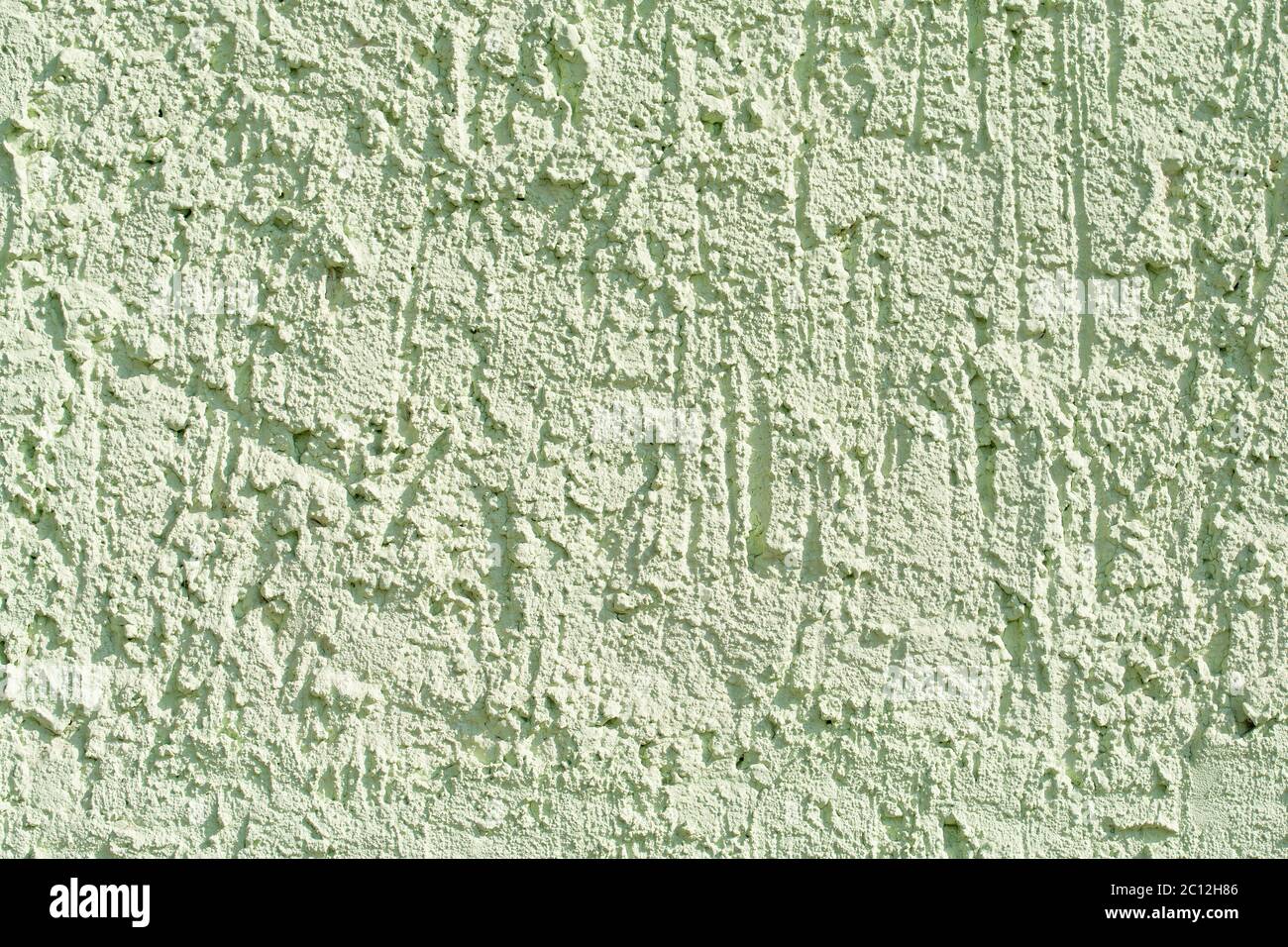 Green textured plaster in a close-up Stock Photo - Alamy