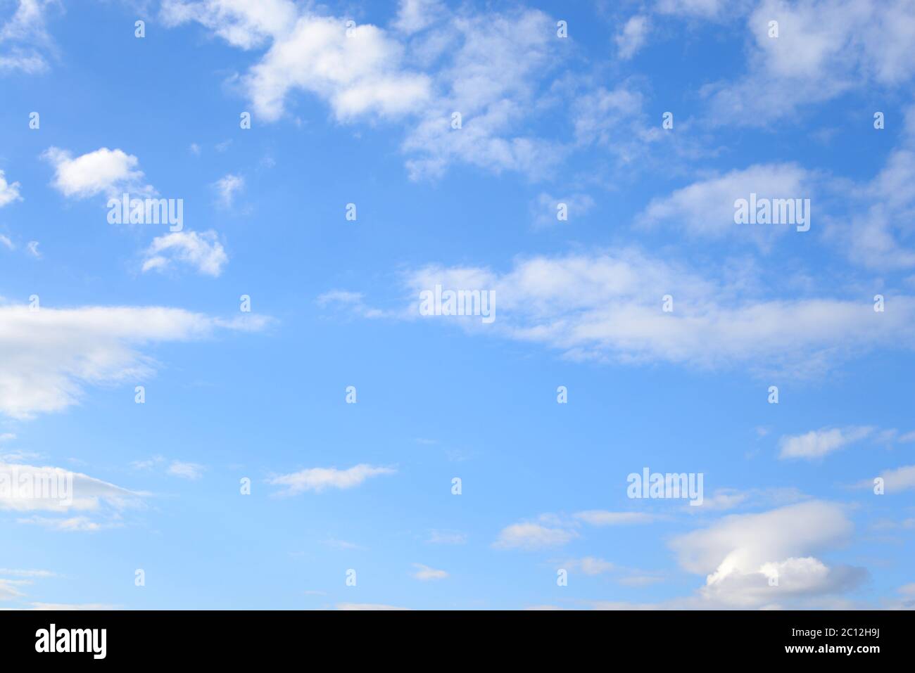 Blue sky with spindrift clouds Stock Photo - Alamy