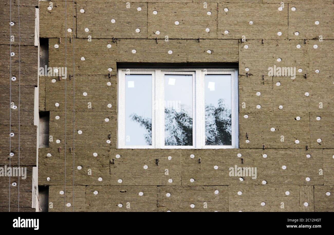 windows in a newly built house. wall structure with insulated non ...