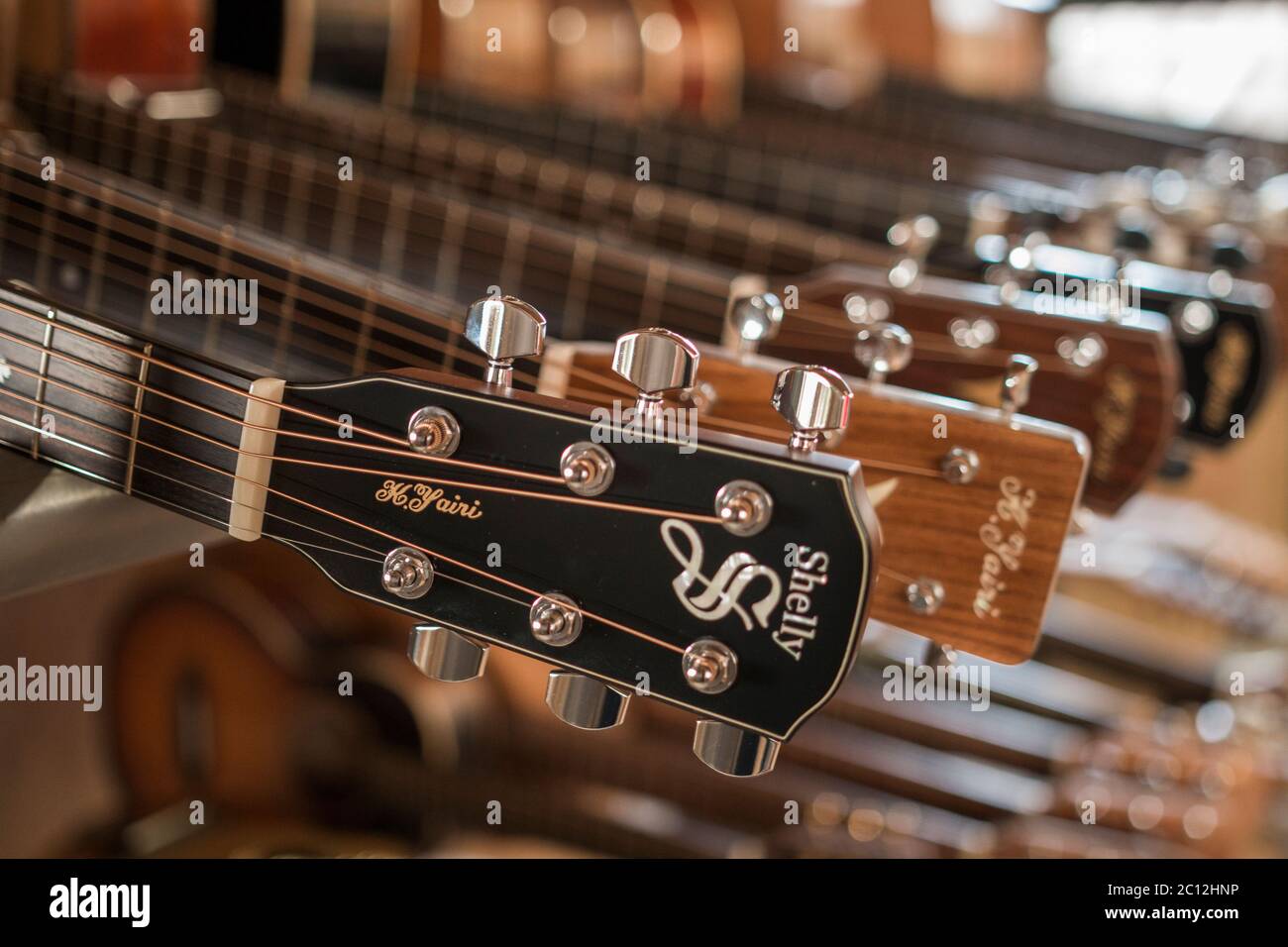 Guitars and ukeleles in production at Yairi guitar factory in Kani City ...