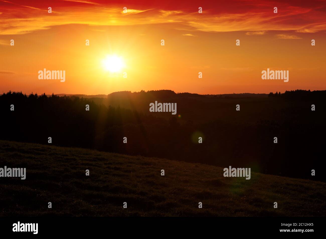 Sunrise over black forest mist Stock Photo - Alamy