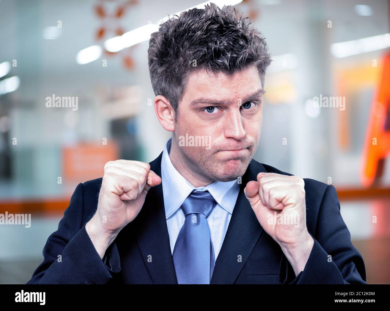 Man clenching fist in hi-res stock photography and images - Alamy