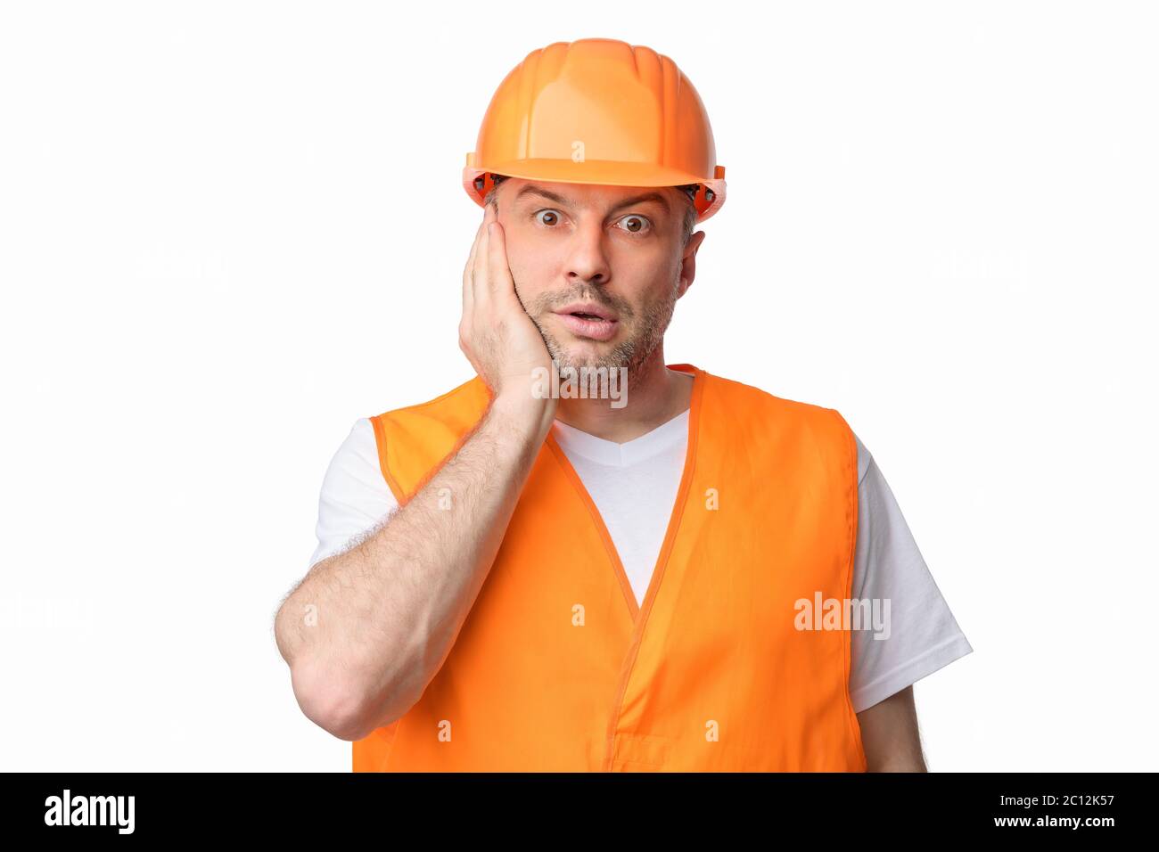 Confused Construction Worker Touching Face Posing Over White Studio ...