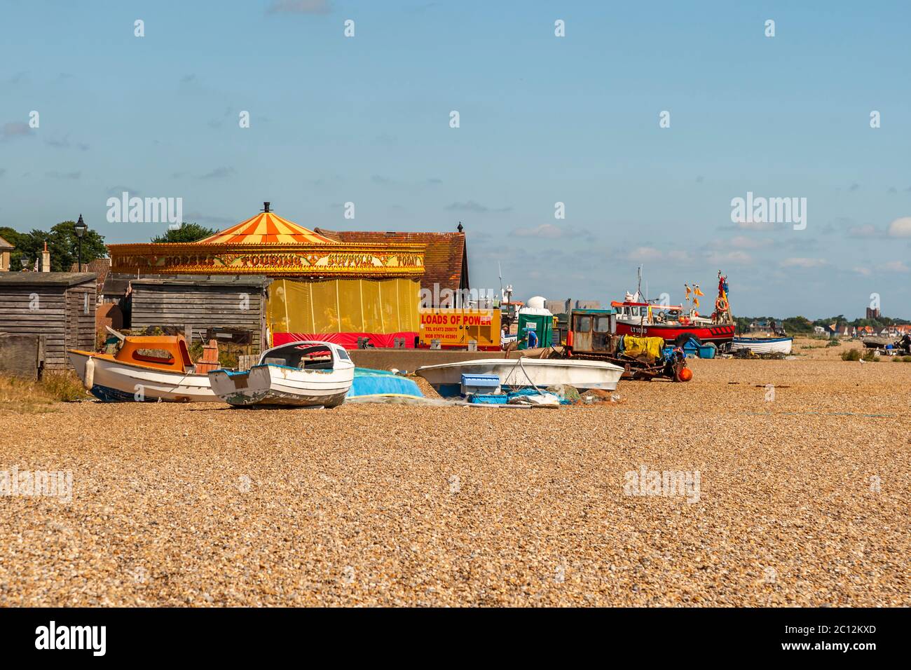 Carousel stands still on the beach of East Suffolk, England Stock Photo ...