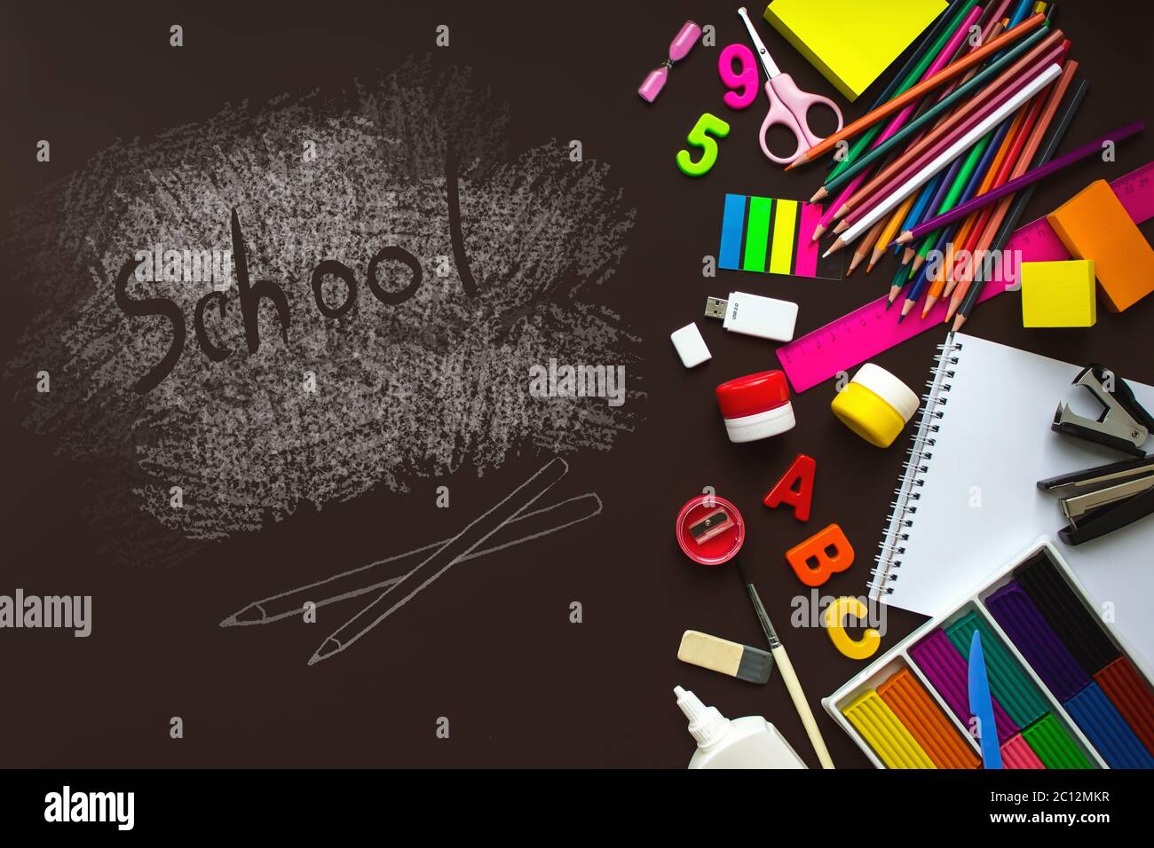 Frame with school supplies on Blackboard background. Top view. School ...