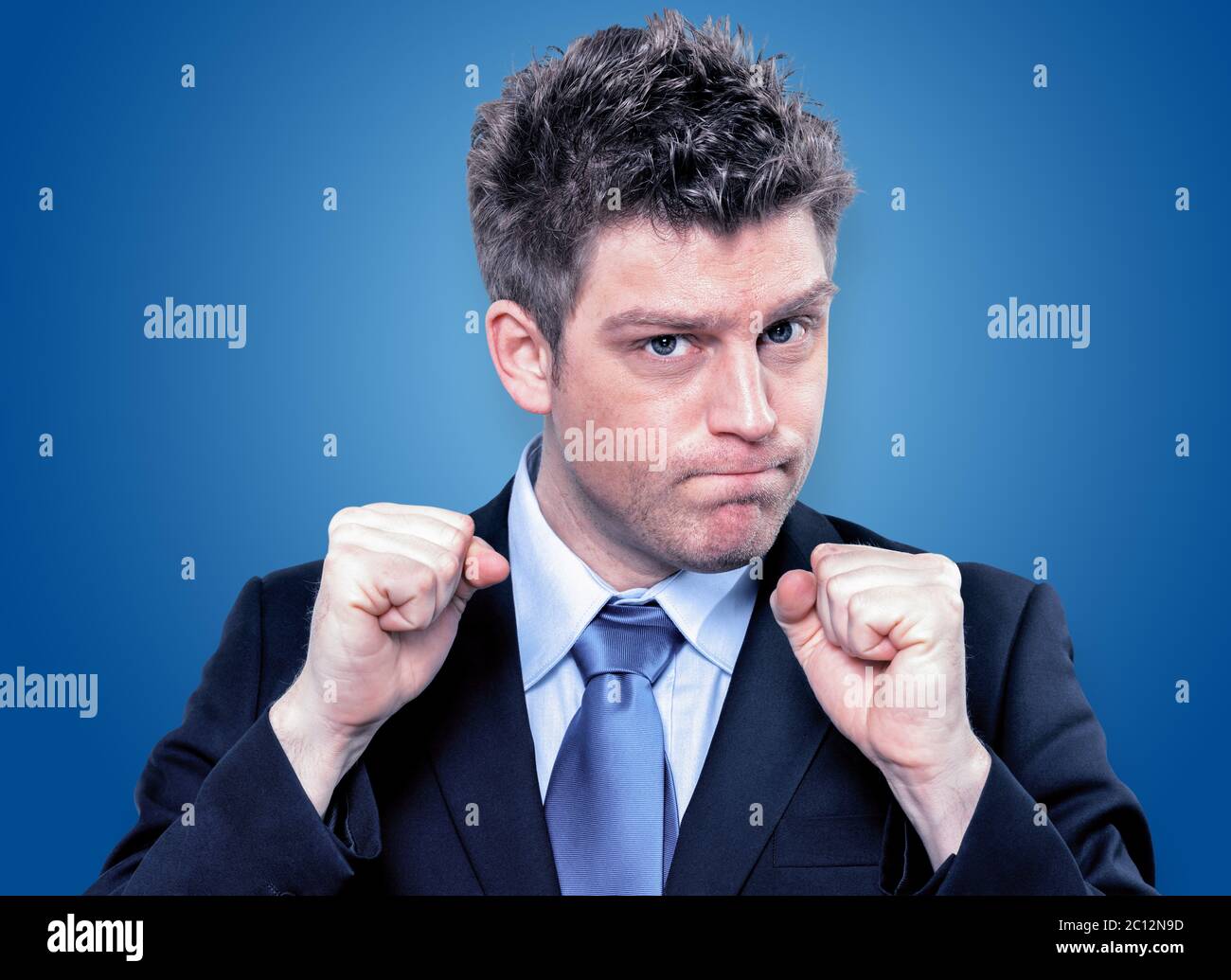 Man clenching fist in hi-res stock photography and images - Alamy