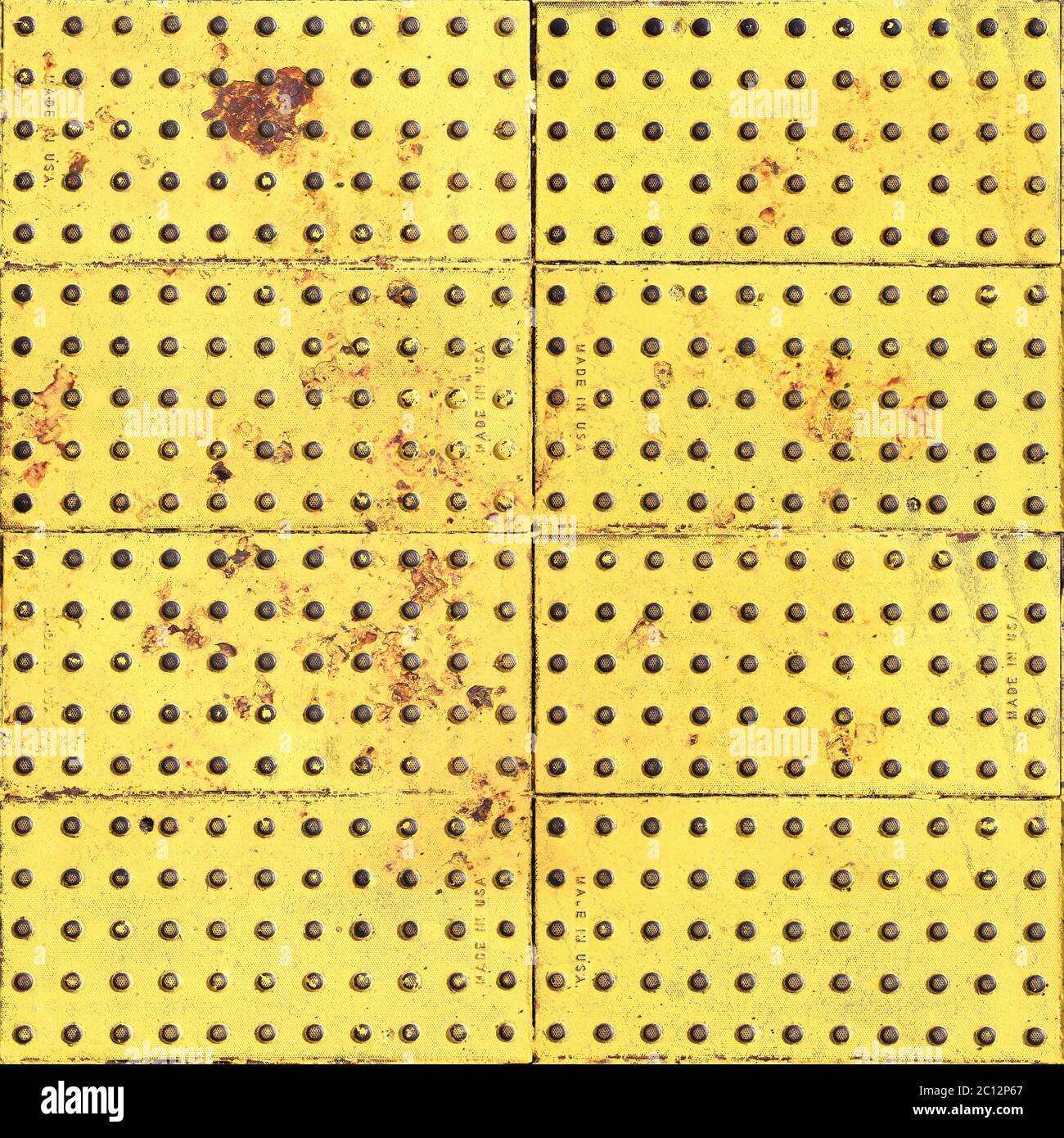 Seamless texture of metal sidewalk panels with bumping dots painted in ...