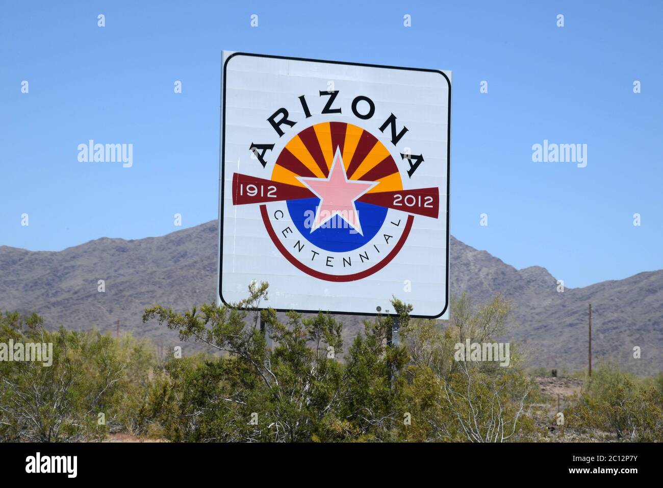 An Arizona Centennial 1912-2012 sign on the Interstate 10 freeway amid ...