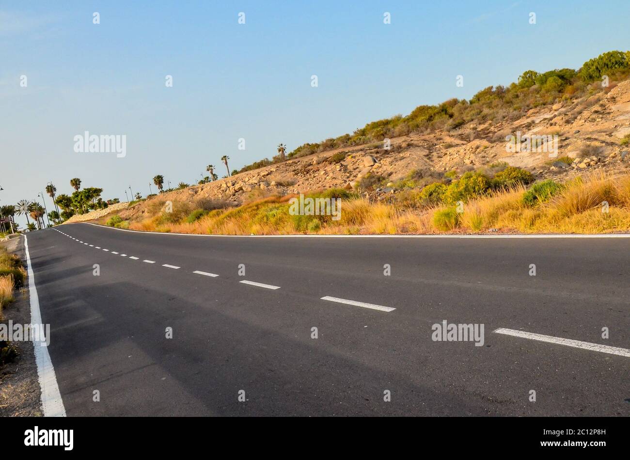 Long Lonely Road Stock Photo - Alamy