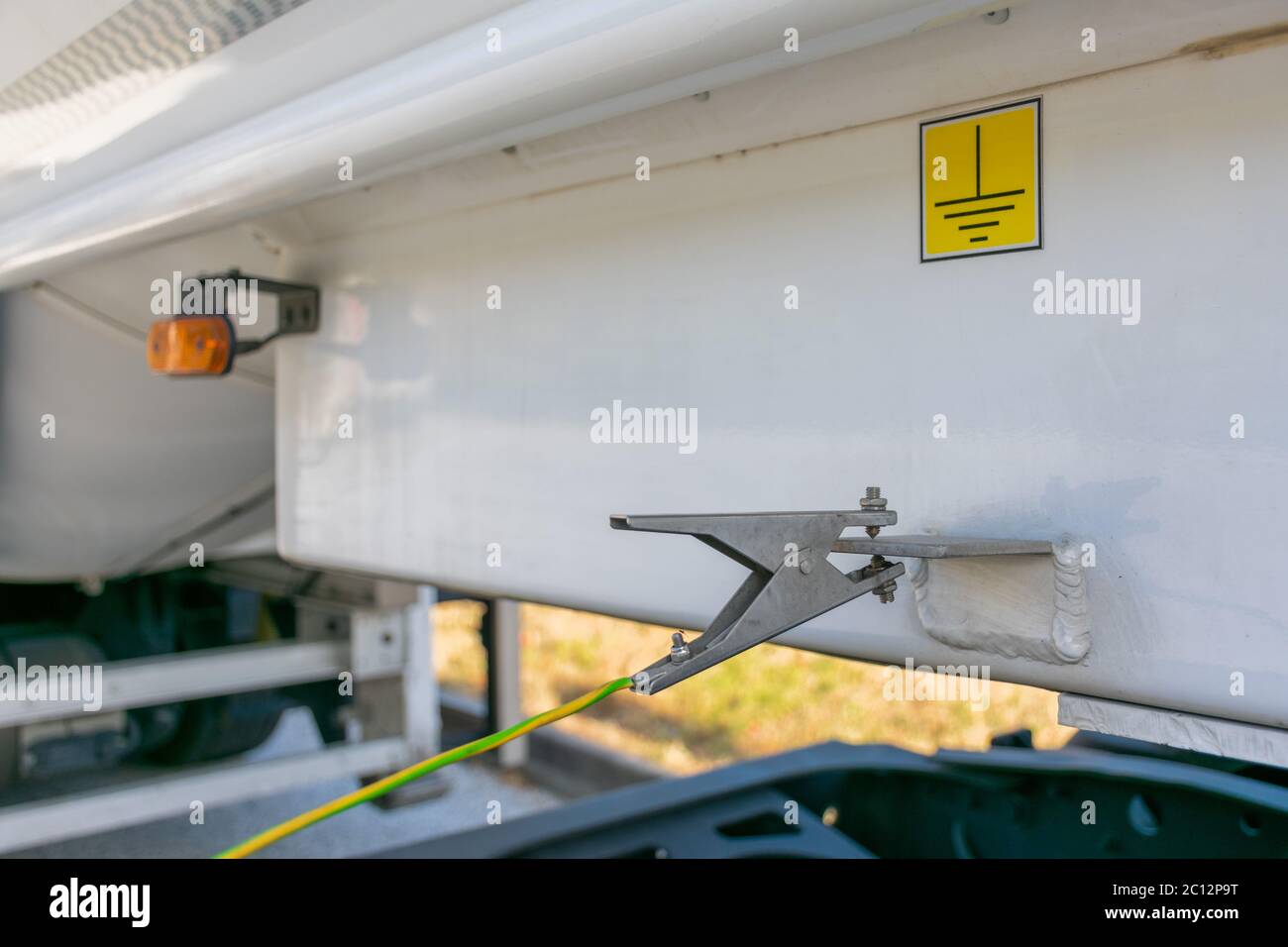 Clamp for discharge of electrostatic energy in fuel tank truck ...